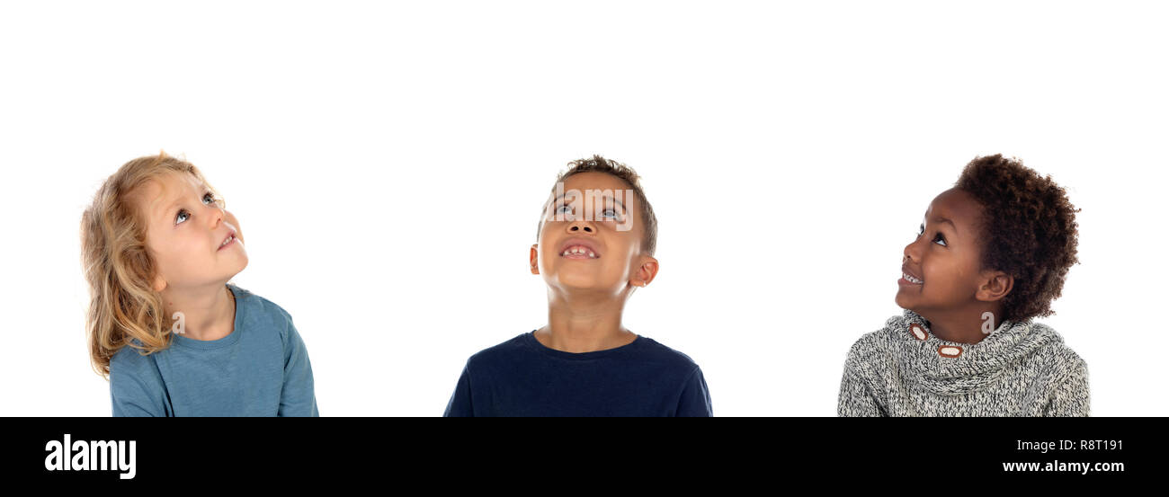 Three happy children looking up isolated on a white backround Stock ...