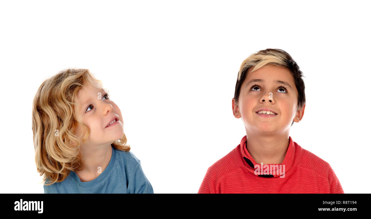 Two happy children looking up isolated on a white backround Stock Photo ...