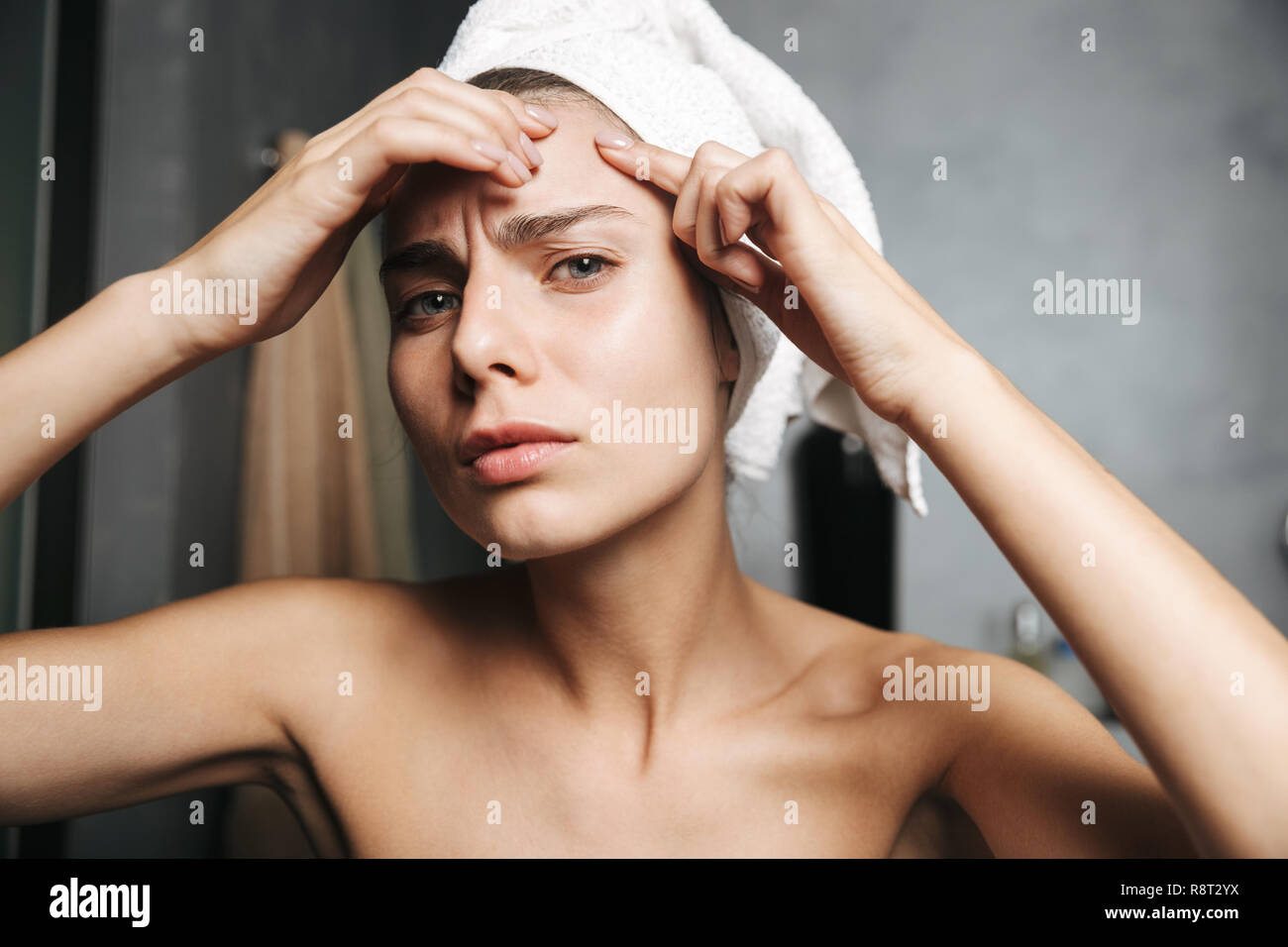 Woman mirror face zit hi-res stock photography and images - Alamy
