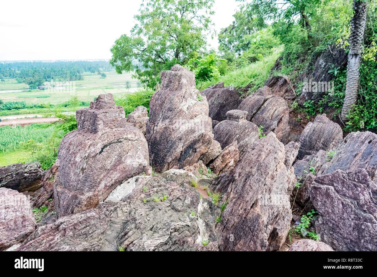 top view of circular shaped big rock at top of a hills looking good ...