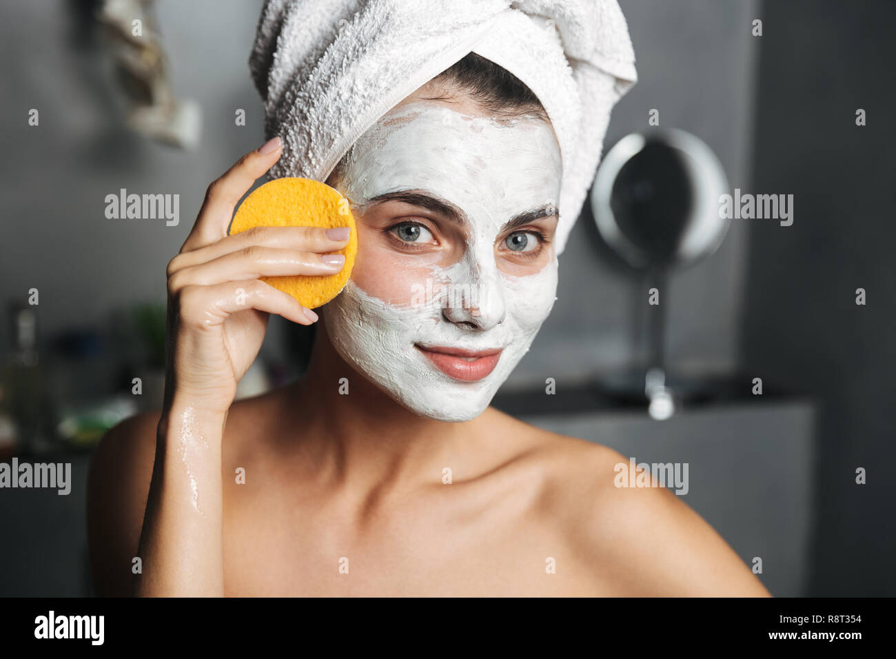 Woman removing mask cosmetic hi-res stock photography and images - Alamy
