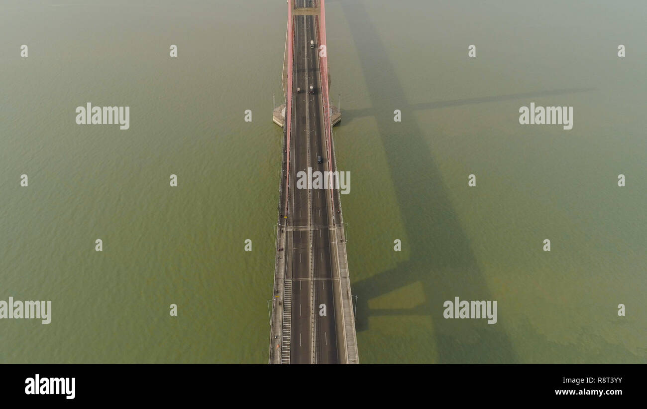 aerial view suspension cable bridge Suramadu over madura strait ...