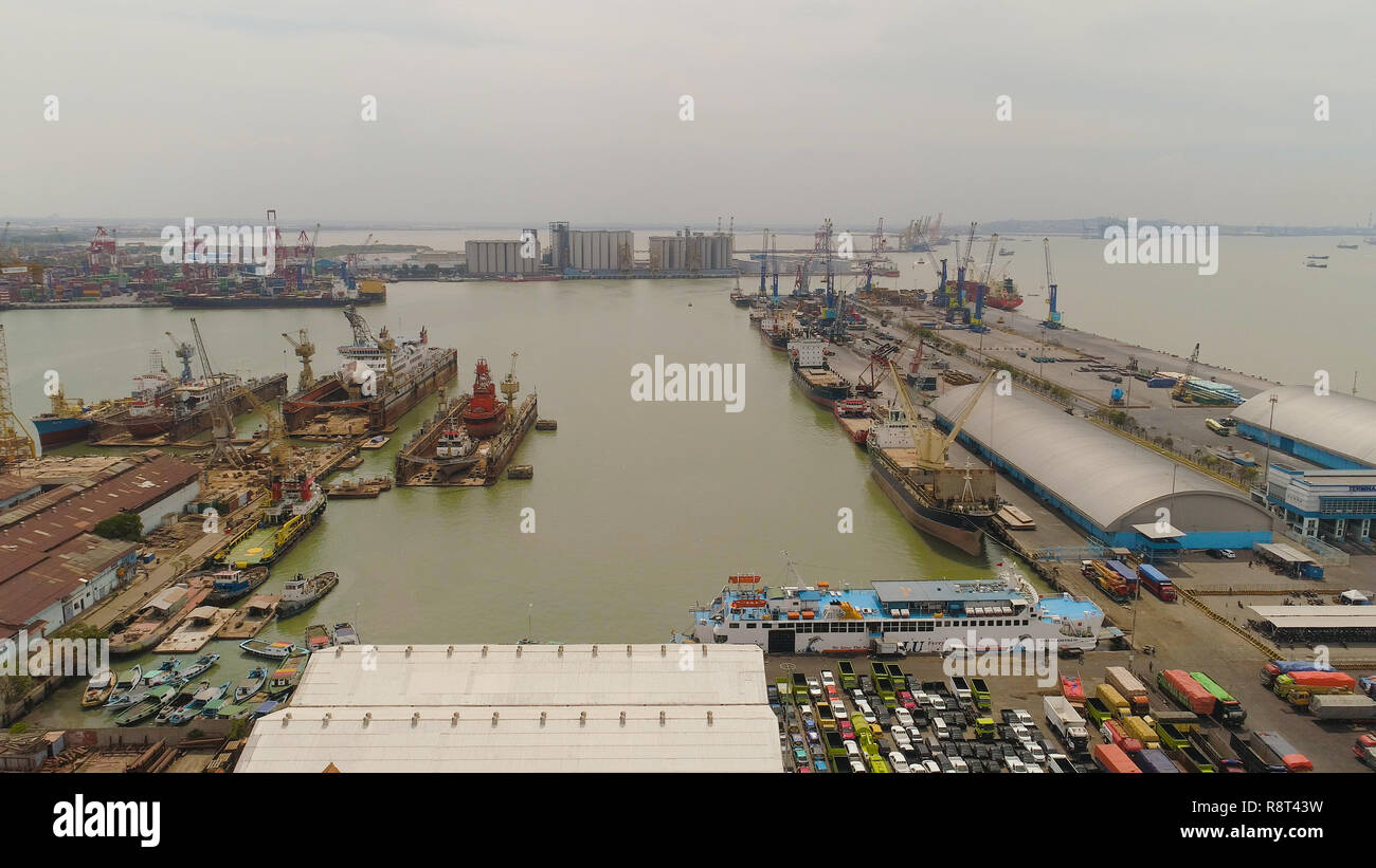 aerial view cargo and passenger seaport with ships and crane Tanjung ...