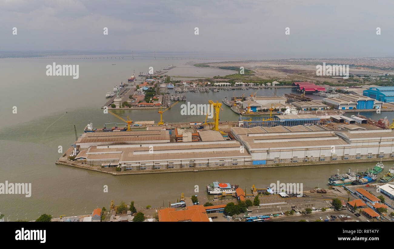 aerial view cargo and passenger seaport with ships and crane Tanjung ...