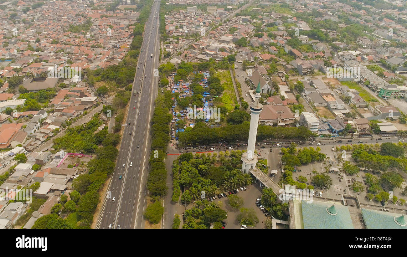 aerial view cityscape city Surabaya with mosque Al Akbar, highway ...