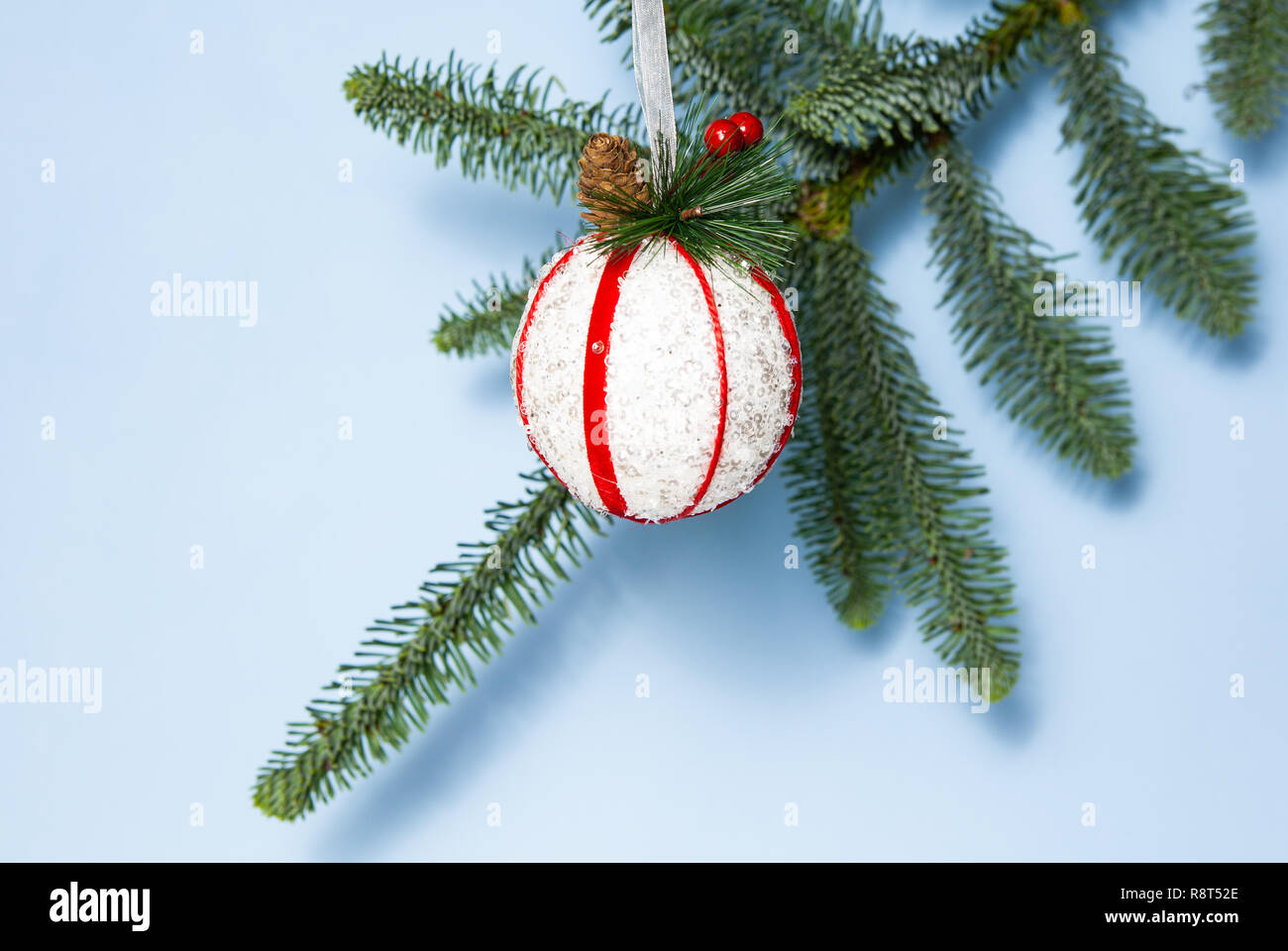Christmas tree ball and fir tree, close-up Stock Photo - Alamy