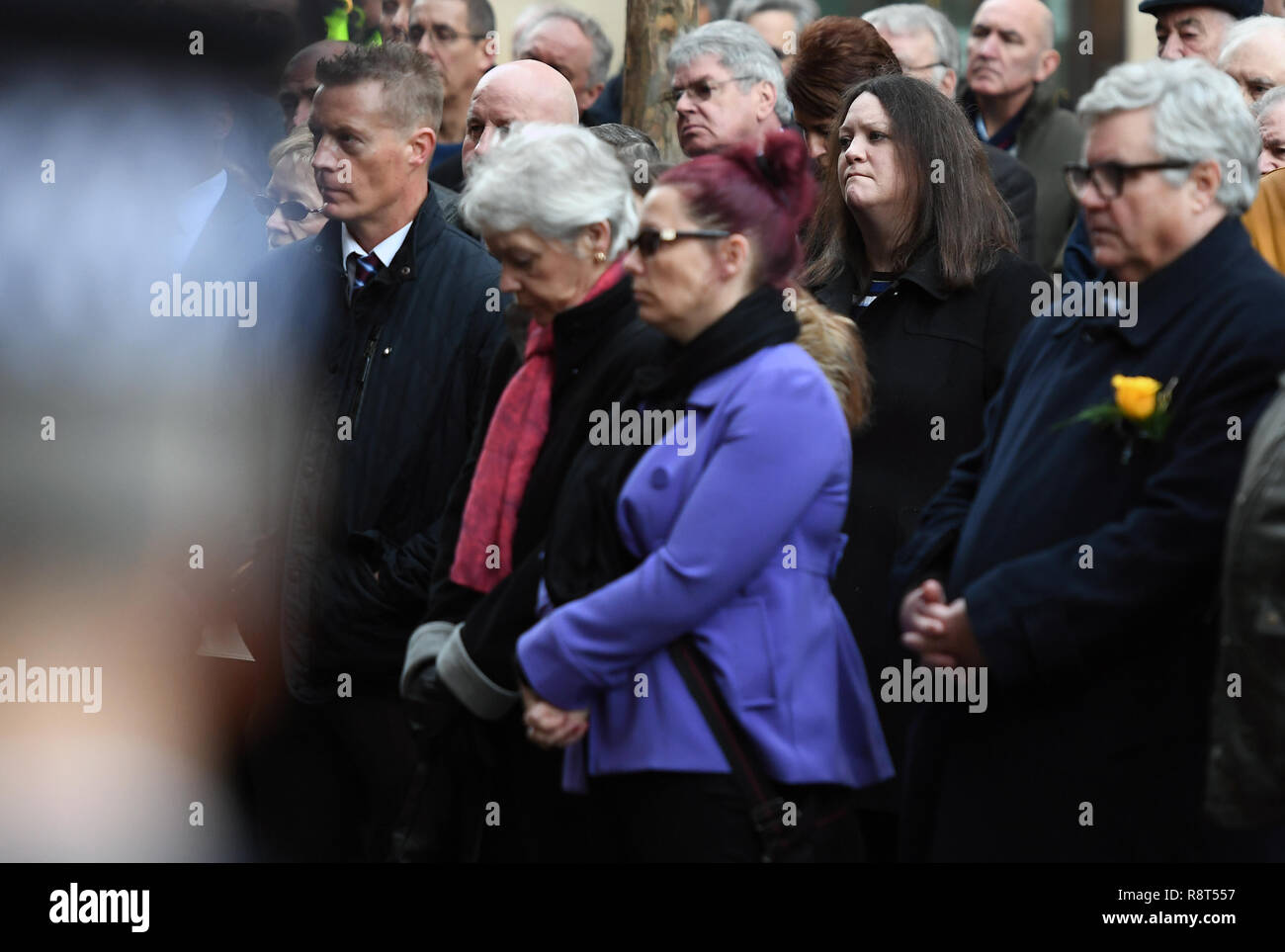 Susanne Dodd (second right, background, dark coat), the daughter of ...
