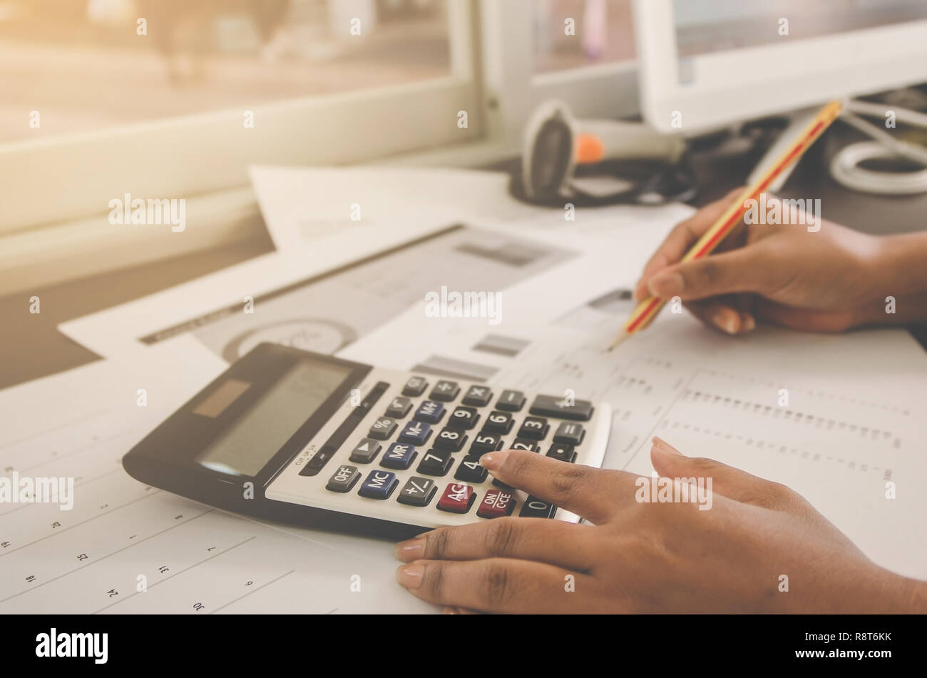 Business concept of financial and accounting with human hand are ...