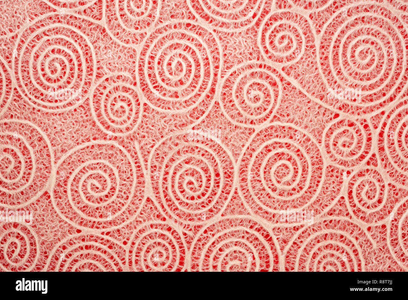 Japanese Washi tissue with white Uzumaki pattern spirals against red ...