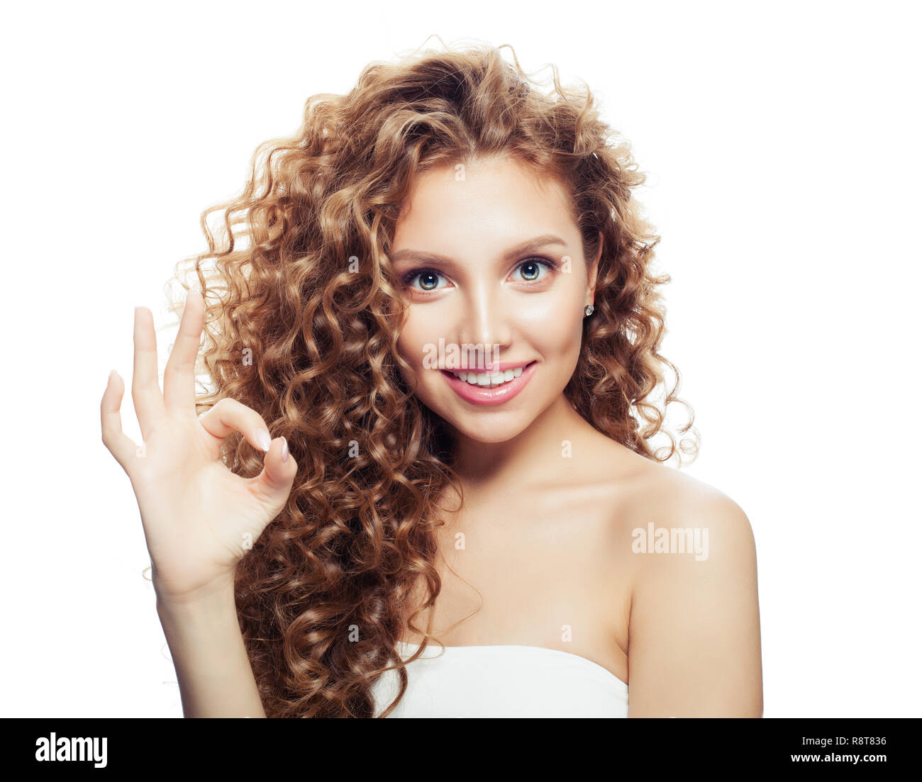 Young woman showing ok sign isolated on white. Happy girl hand okay ...