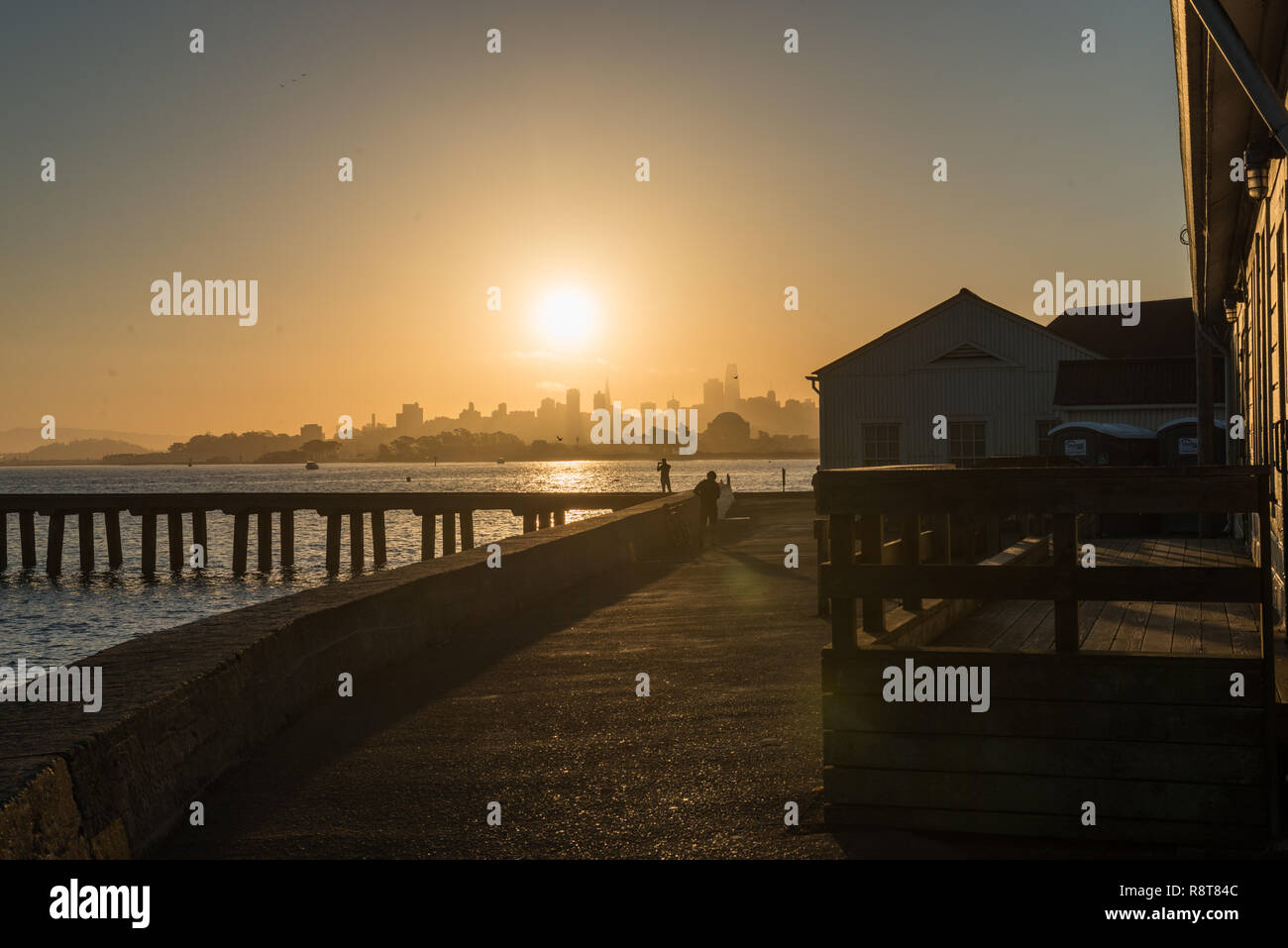 Torpedo Wharf and downtown silhouette at sunrise in San Francisco Stock ...