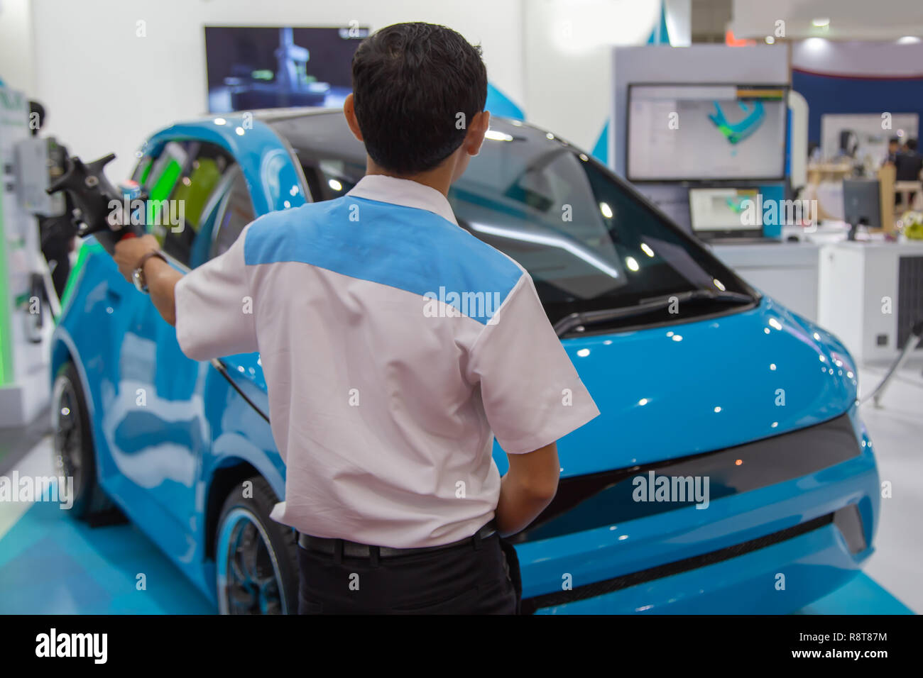 Worker perform handheld 3D scan for car quality control of geometries ...