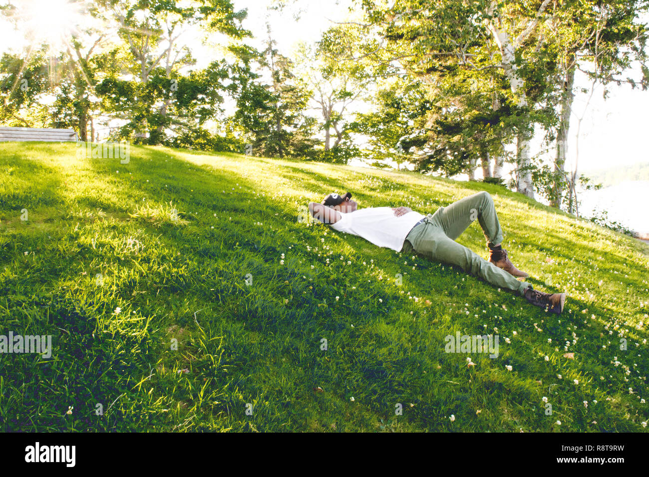 Man sleeping in sun hi-res stock photography and images - Alamy