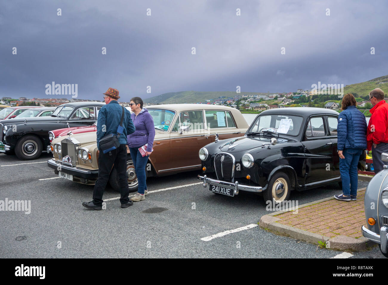 Visitors looking at vintage cars / oldtimers at the Shetland Classic ...