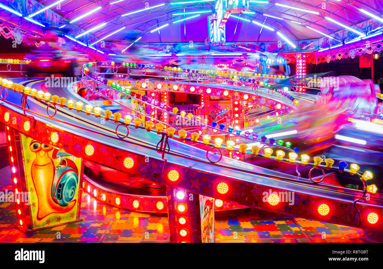 Fairground/funfair ride at night Stock Photo - Alamy