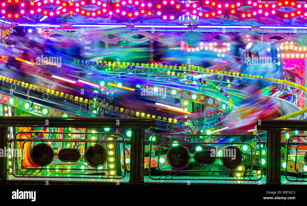 Fairground/funfair ride at night Stock Photo - Alamy