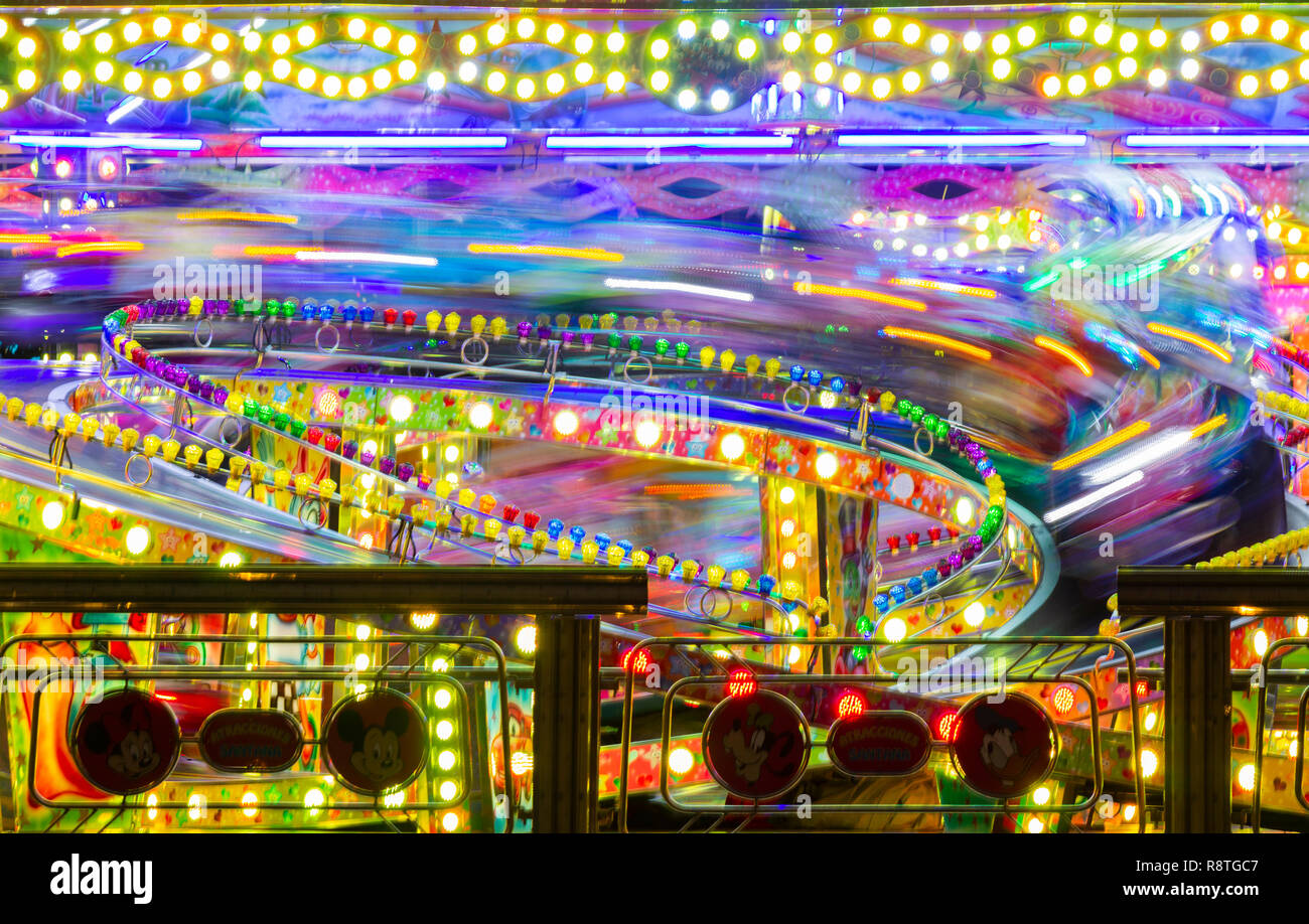 Fairground/funfair ride at night Stock Photo - Alamy