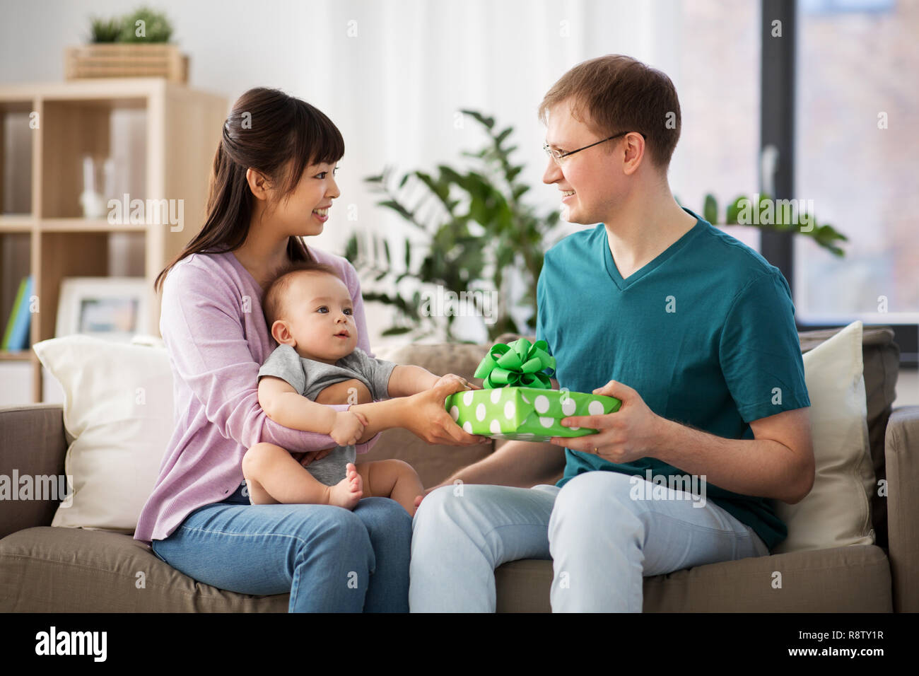 Family mother father baby hi-res stock photography and images - Alamy
