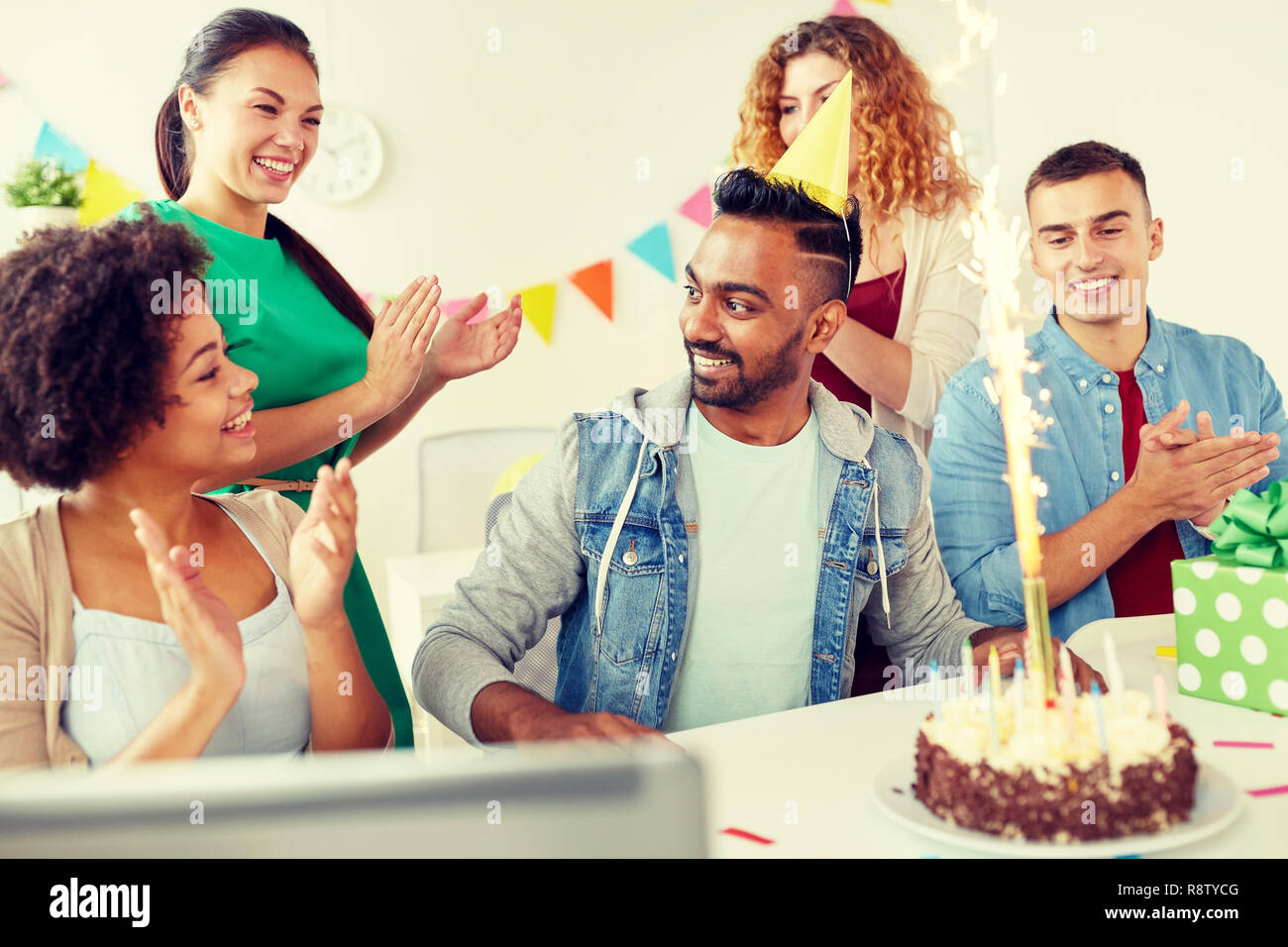 office team greeting colleague at birthday party Stock Photo - Alamy