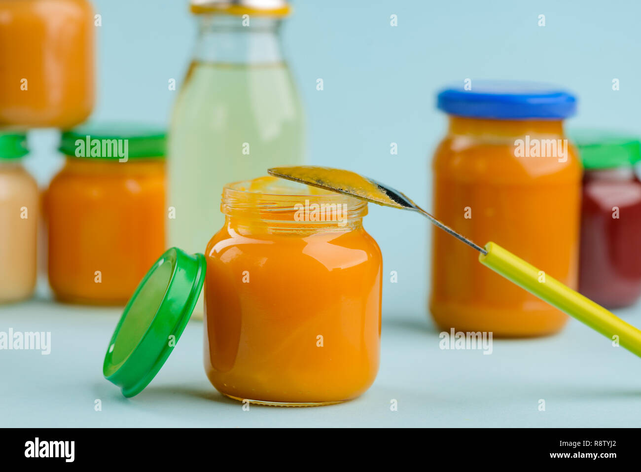 Opened jar of puree Stock Photo - Alamy