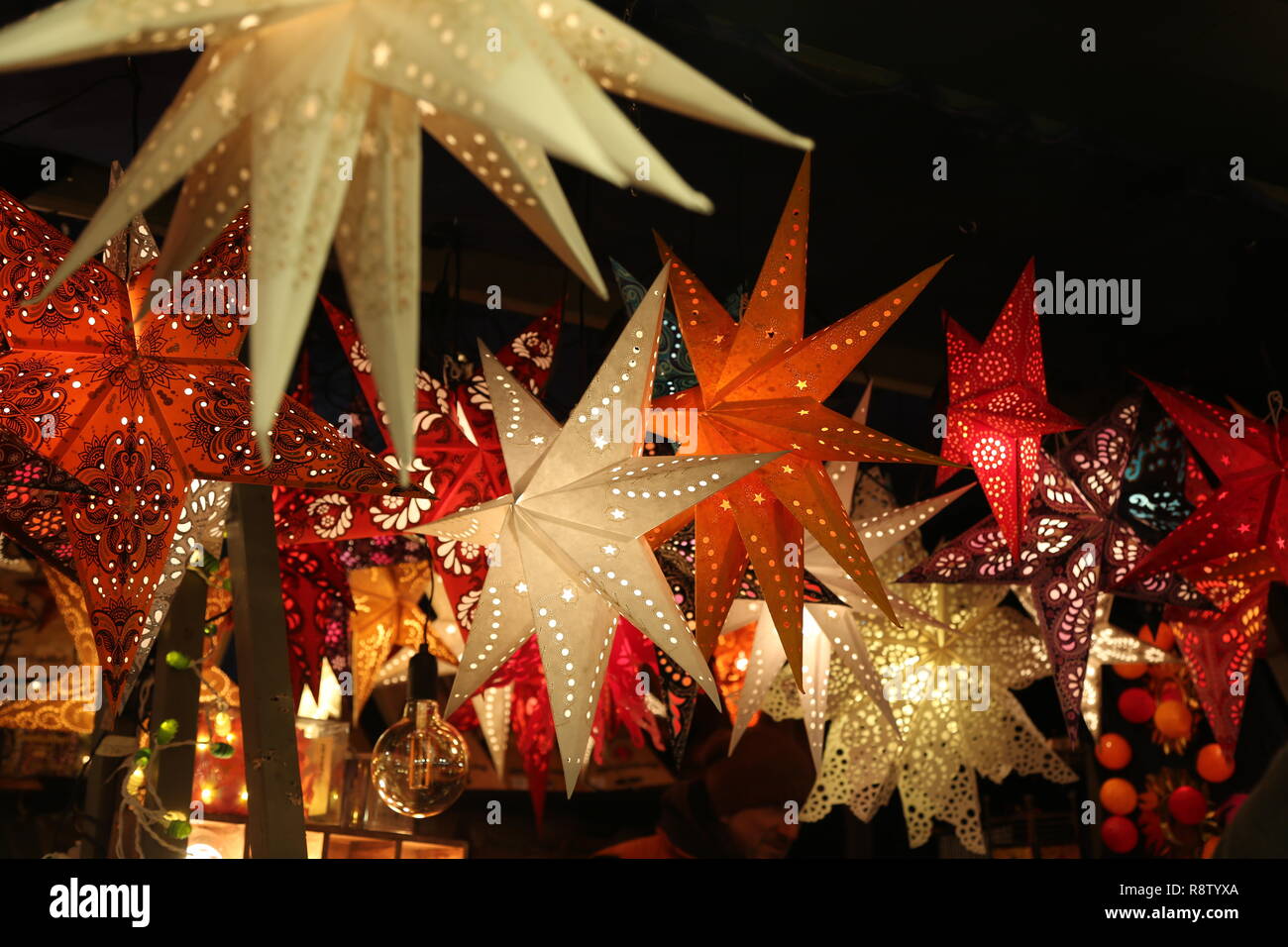 Star lanterns. A background of star lanterns Stock Photo - Alamy