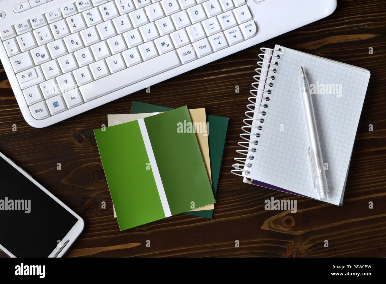 Color samples cmyk on black keyboard desk Stock Photo - Alamy