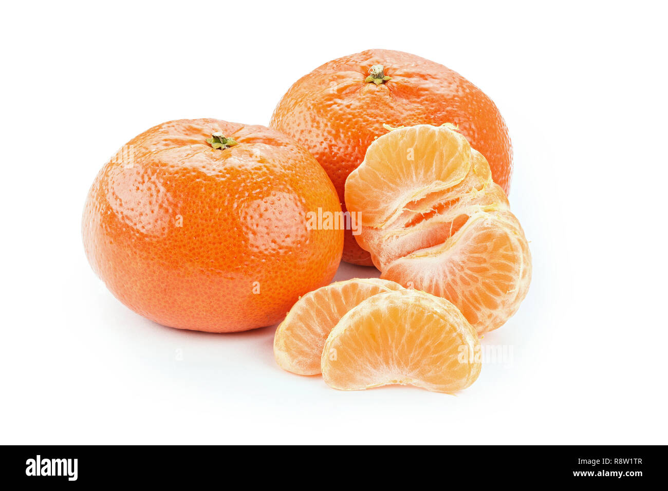 juicy tangerine on a white background. tangerine peel and peeled slices ...