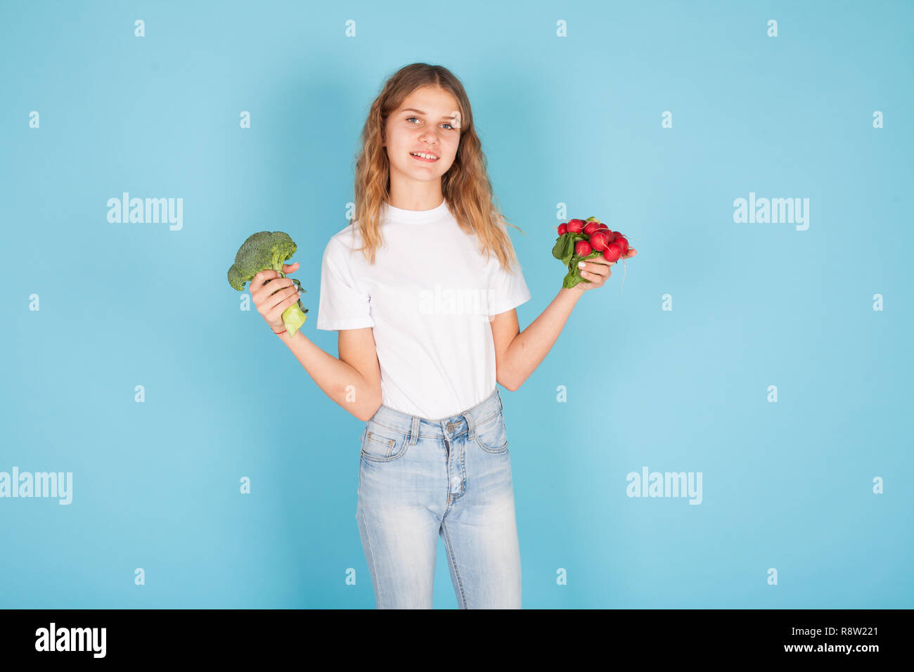Portrait of beautiful girls with fresh vegetables green broccoli Stock ...