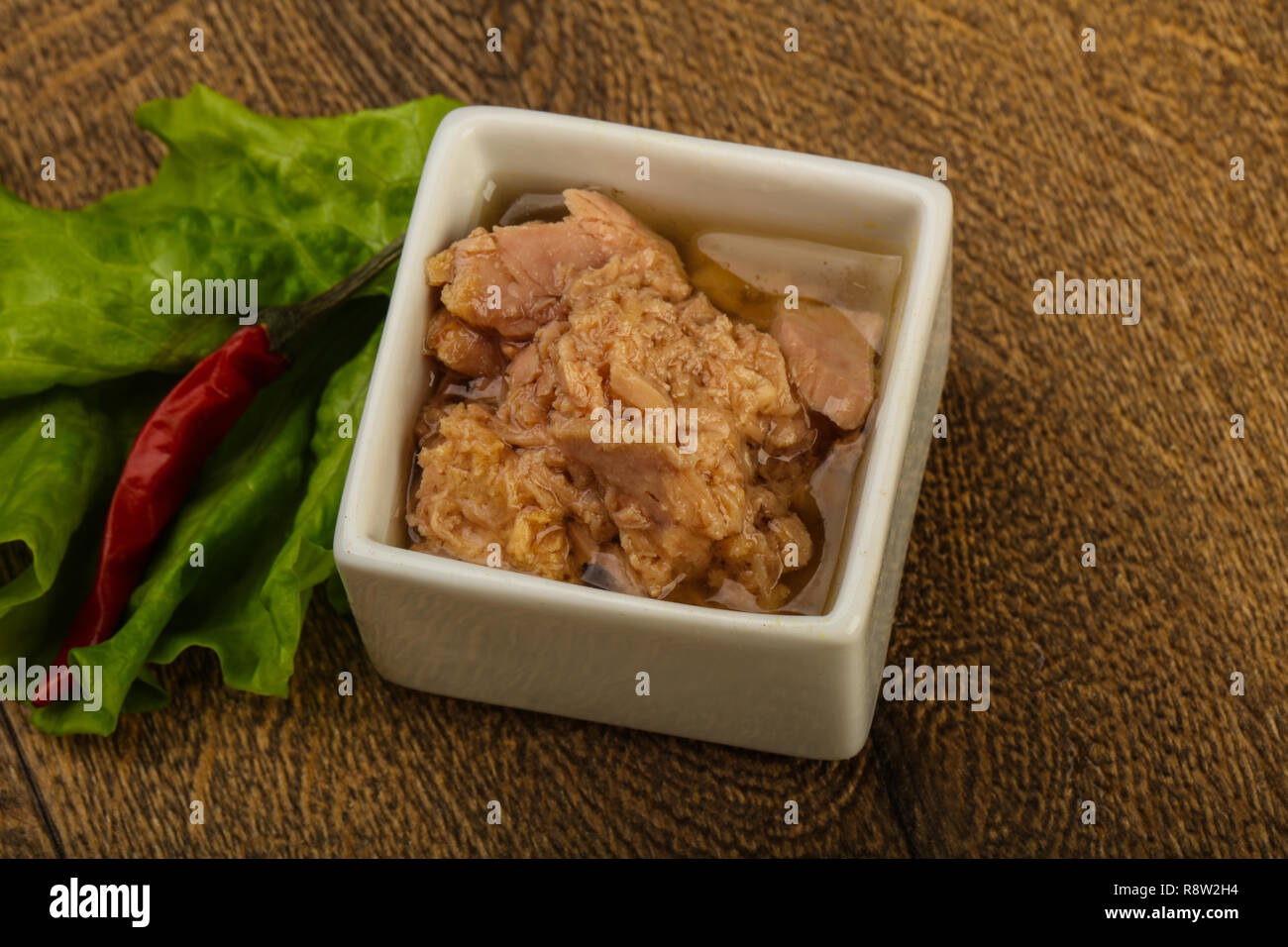 Canned tuna fish in the bowl ready for cooking Stock Photo - Alamy