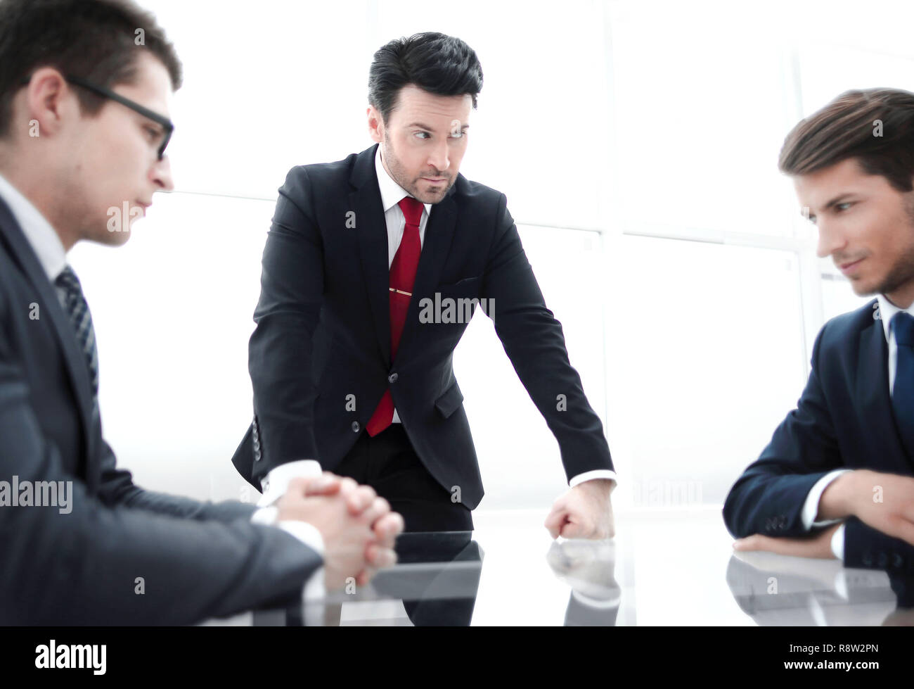 serious boss holds a working meeting Stock Photo - Alamy
