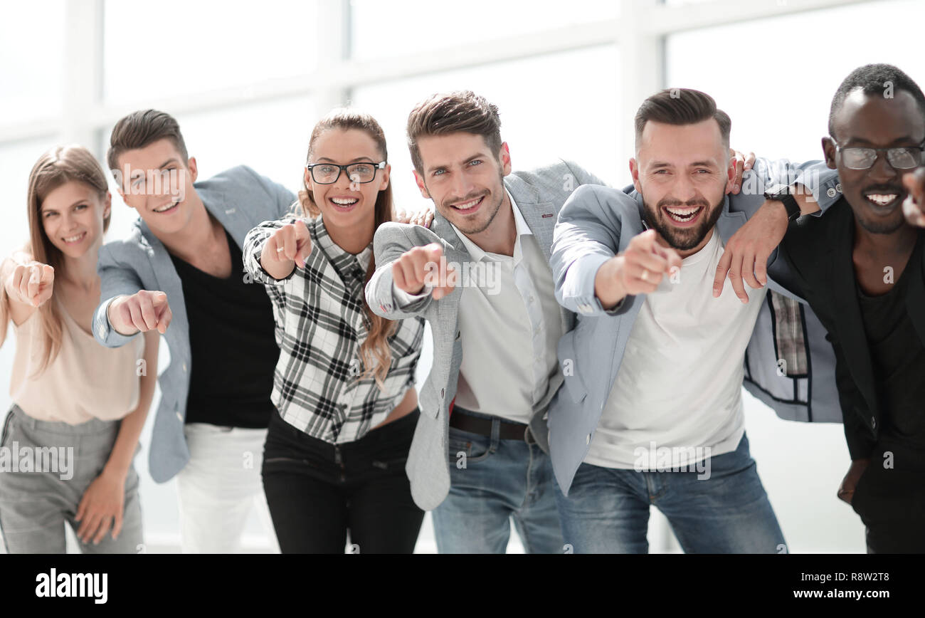 Group of people pointing at the camera and smiling - isolated Stock ...