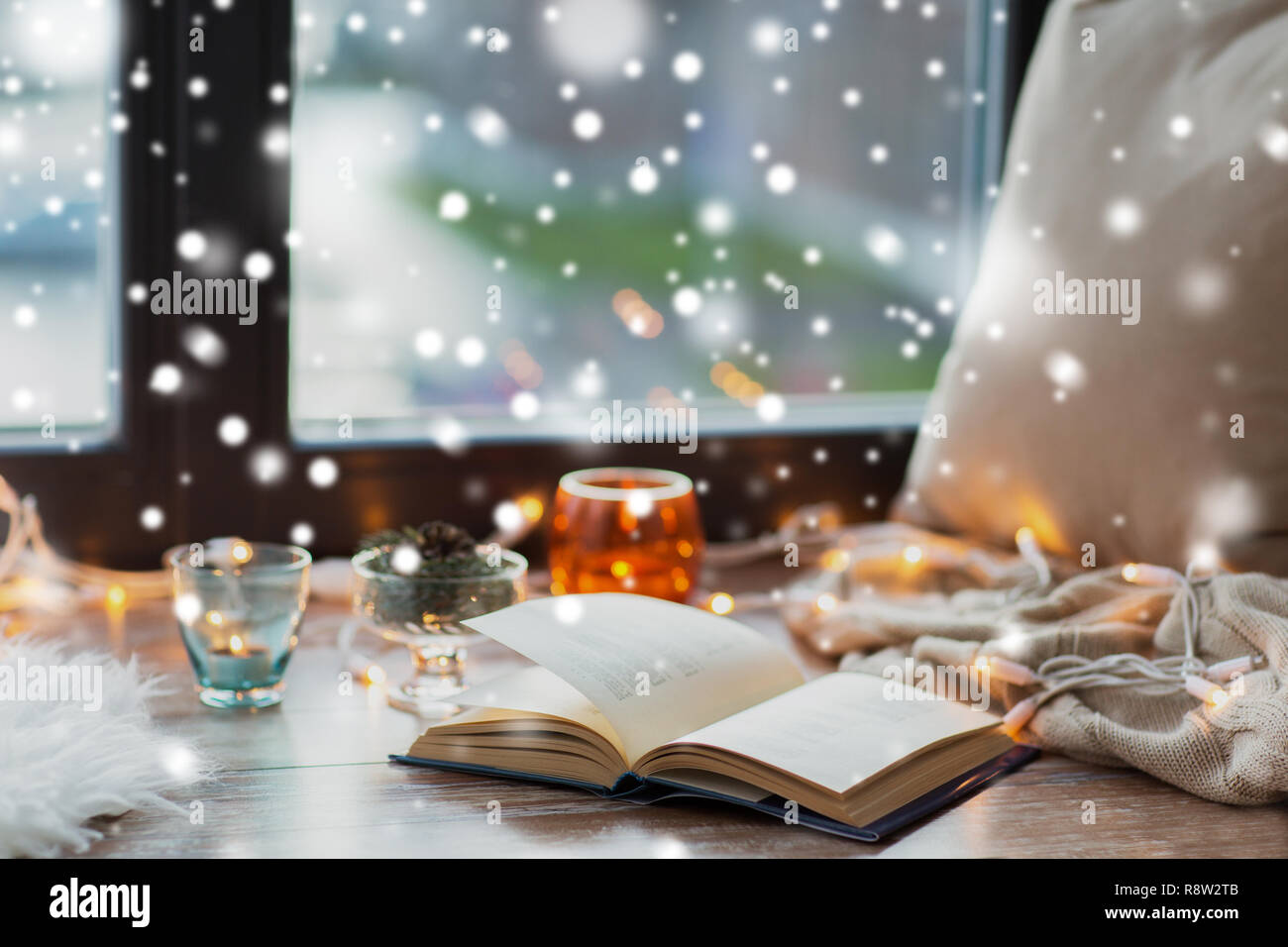 Candle book on sill window hi-res stock photography and images - Alamy