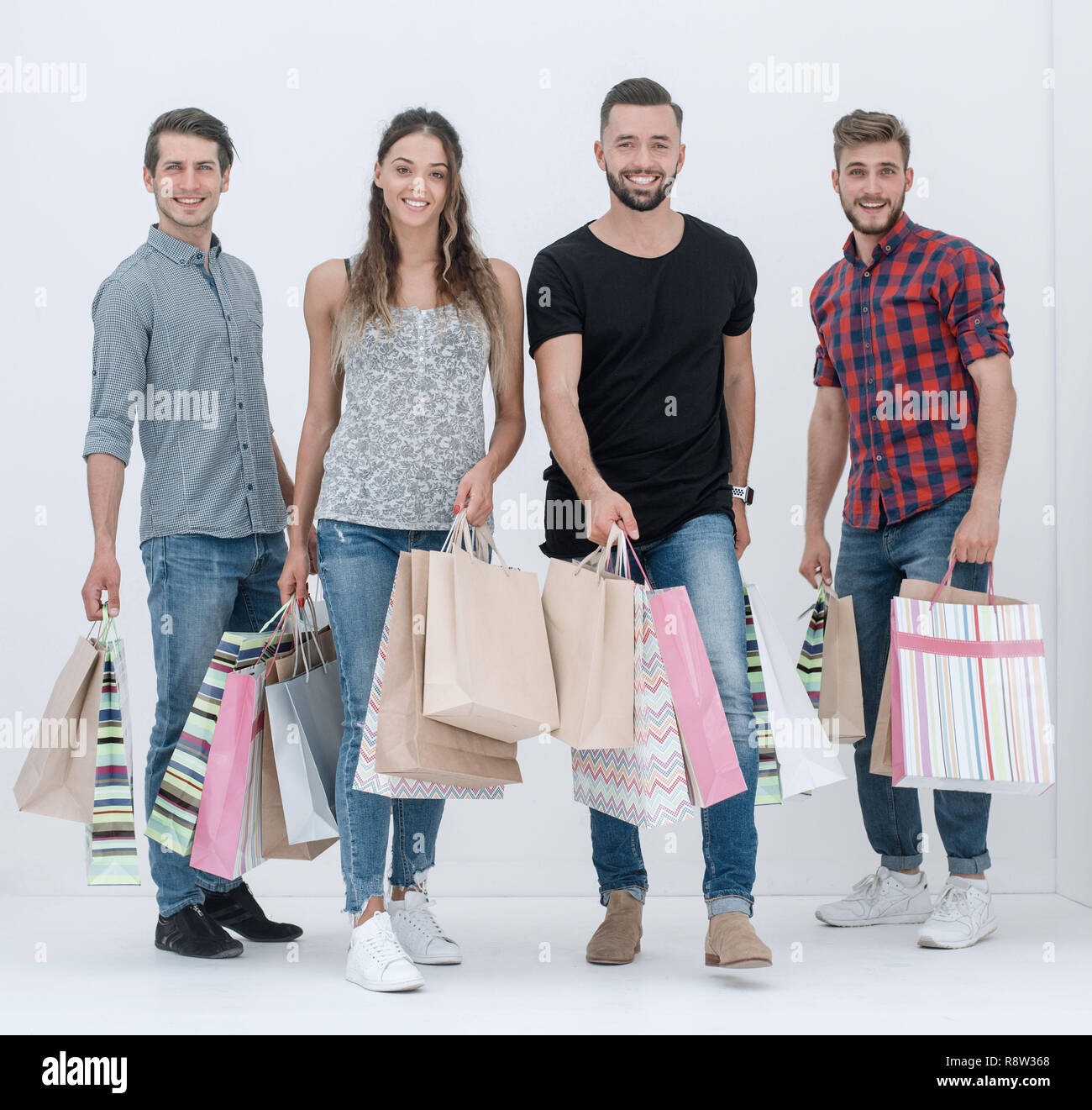 group of young people holding their shopping bags Stock Photo - Alamy