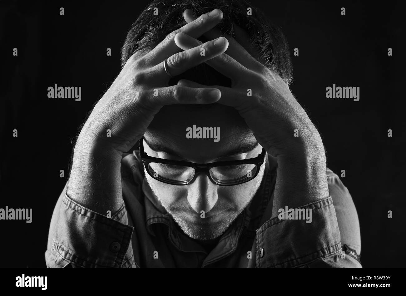 Portrait close up pensive thinking Black and White Stock Photos ...