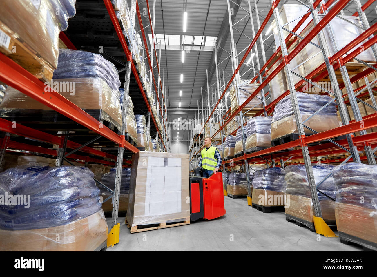 loader operating forklift at warehouse Stock Photo - Alamy