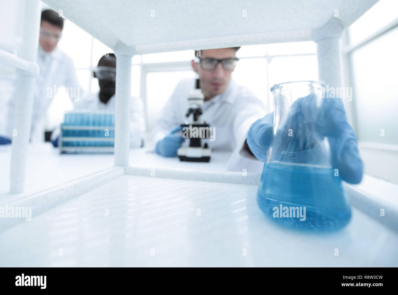 background image of scientists in the laboratory Stock Photo - Alamy