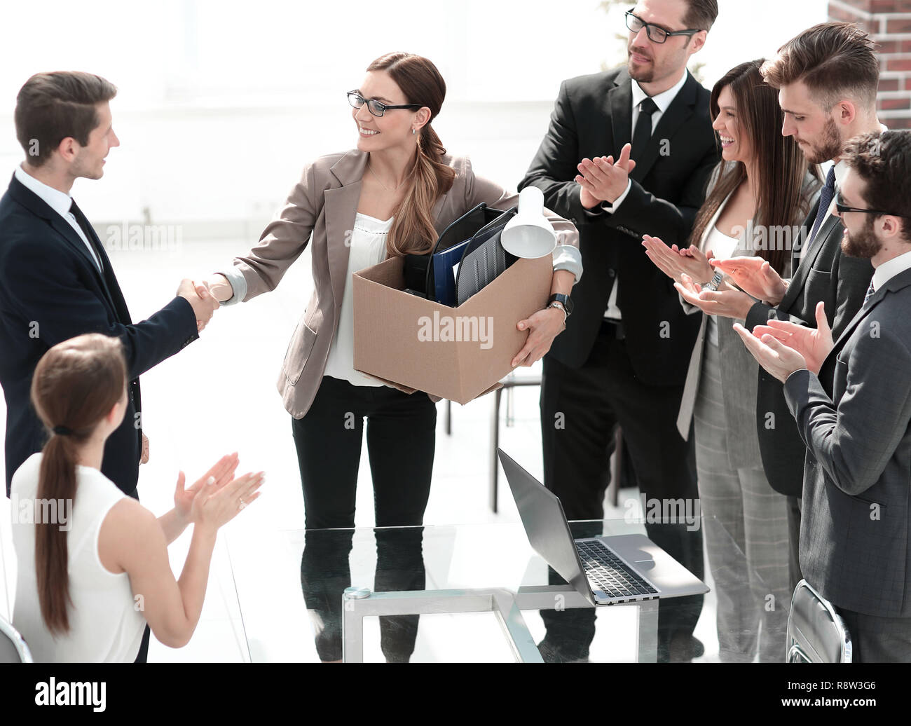 Company boss introducing new employee hi-res stock photography and ...