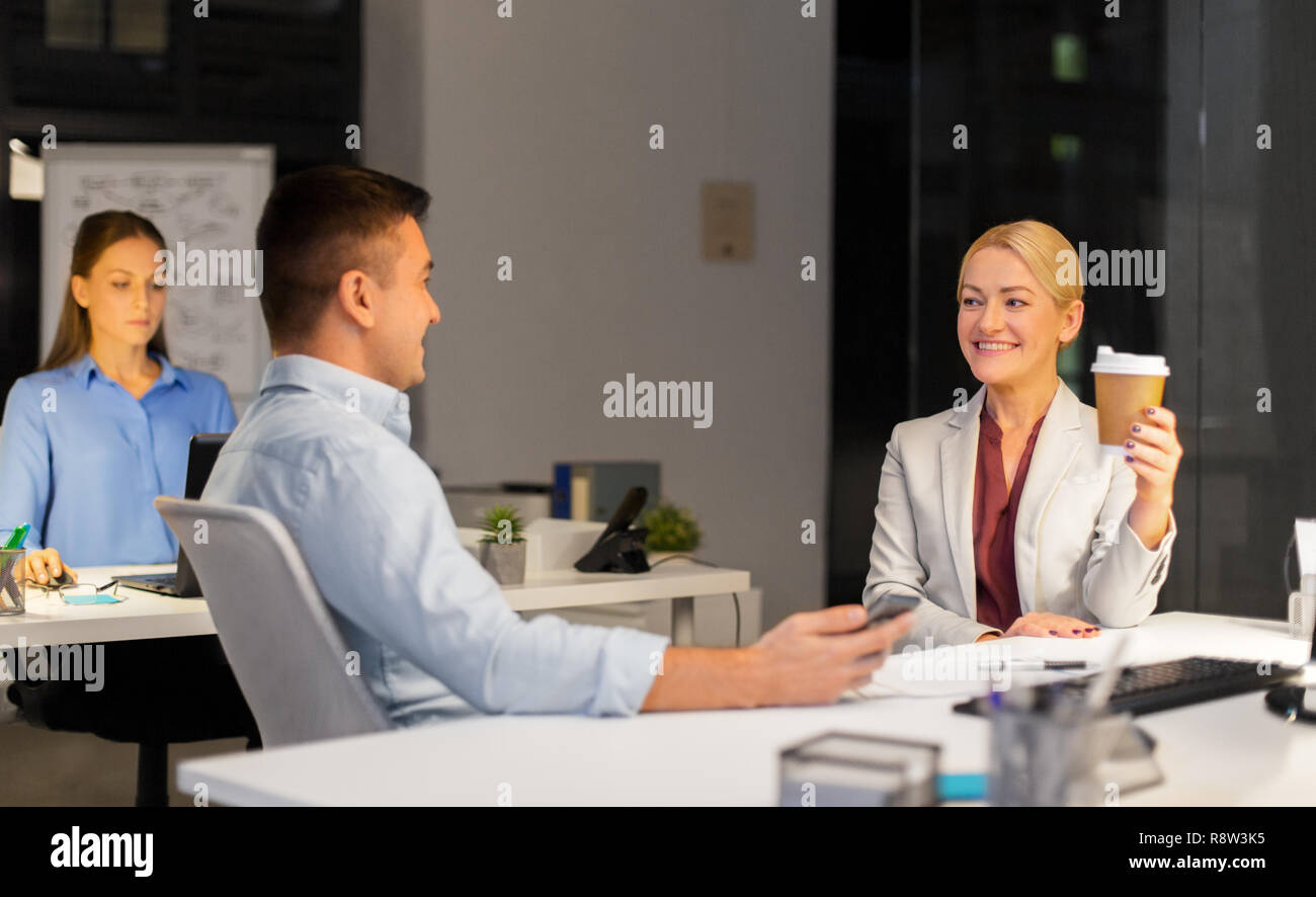Coworker talking coffee hi-res stock photography and images - Alamy
