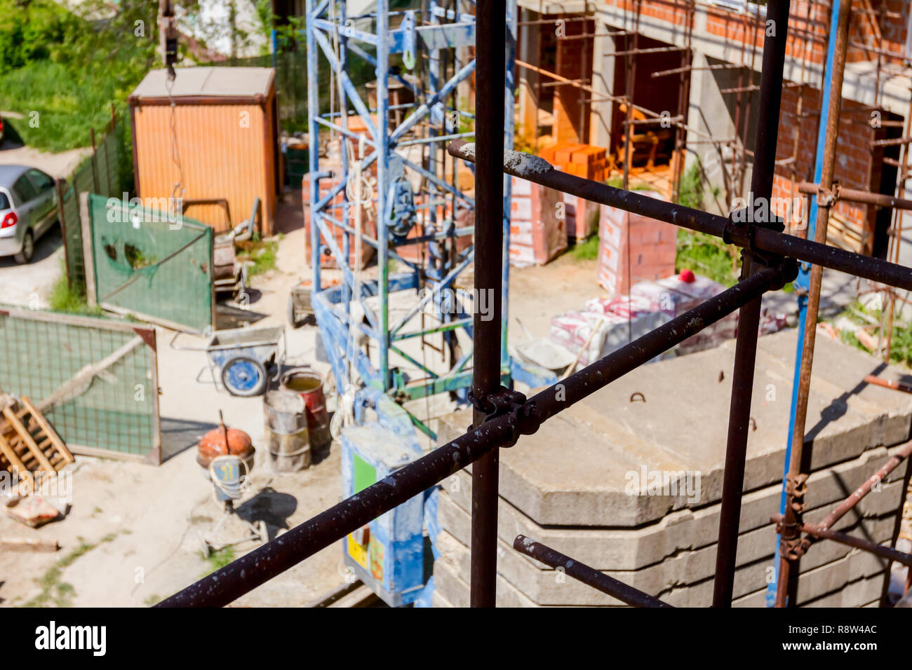 Scaffold is placed against edifice, building under construction Stock ...