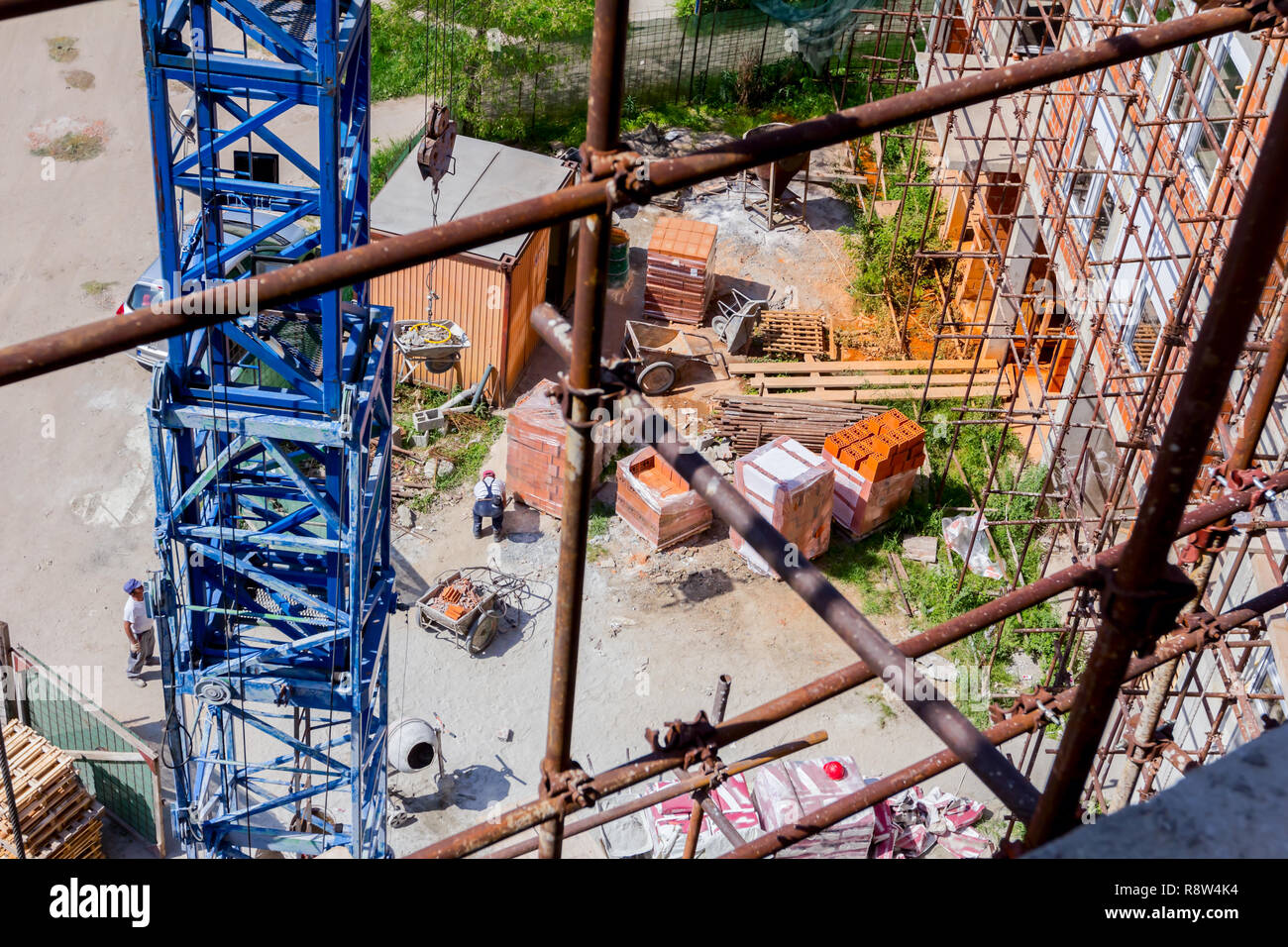 Above view on construction site area, piled resources for building ...