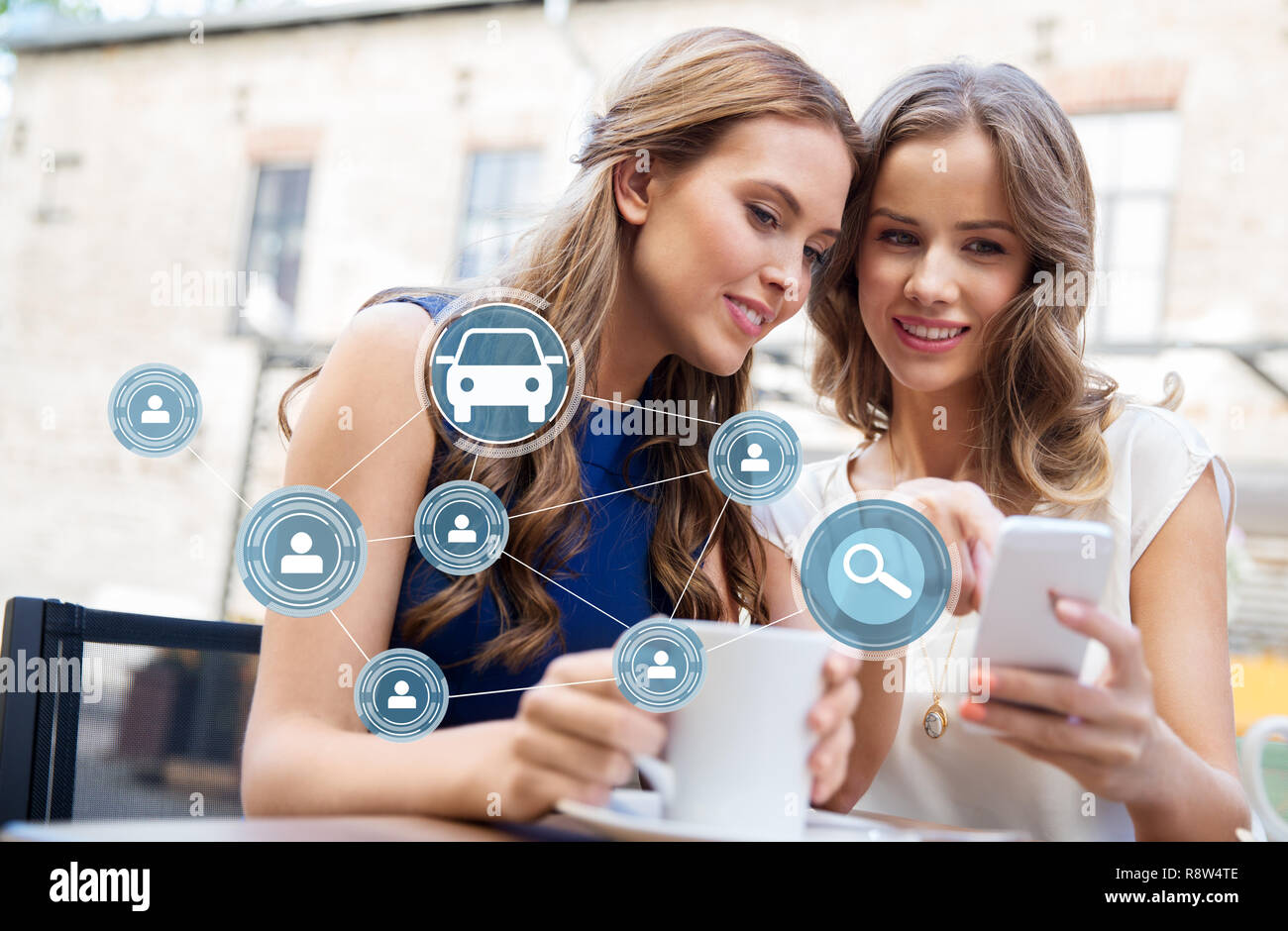 women using car sharing app on smartphone at cafe Stock Photo - Alamy