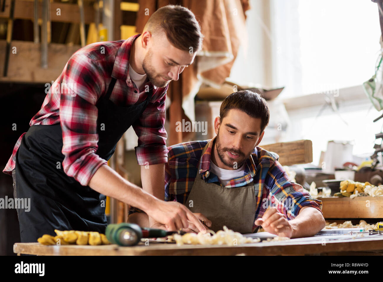Two man working hard hi-res stock photography and images - Alamy