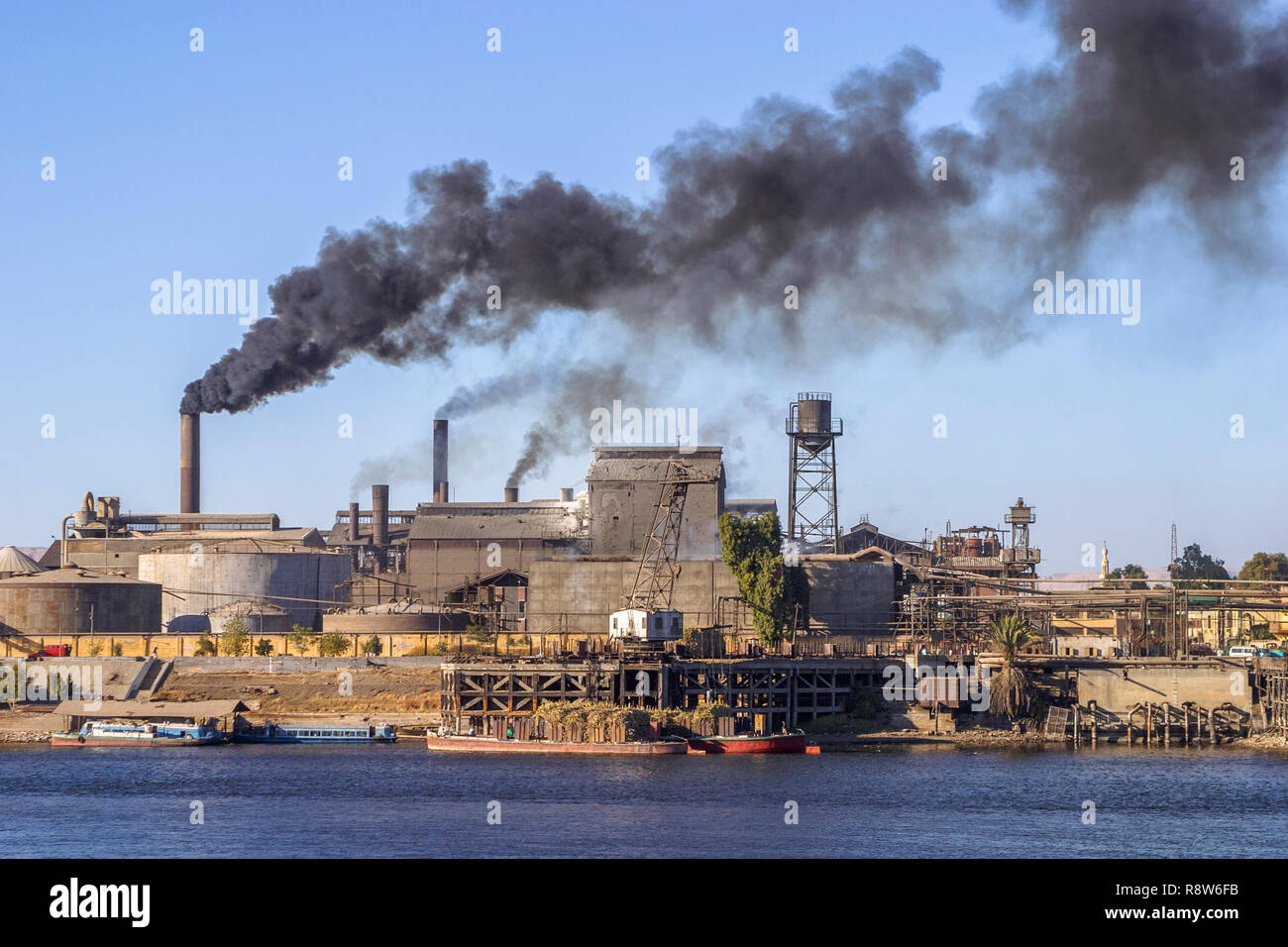 Climate change, global warming: Egyptian sugar factory on the River ...