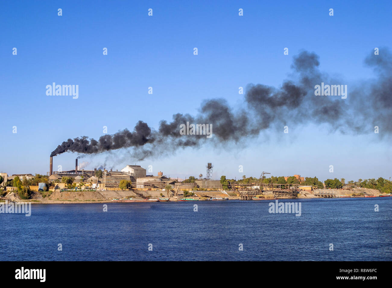 Climate change, global warming: Egyptian sugar factory on the River ...
