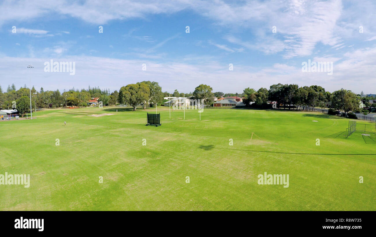 Drone aerial view of Australian public park and sports oval field ...