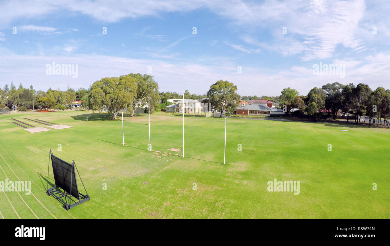 Drone aerial view of Australian public park and sports oval field ...