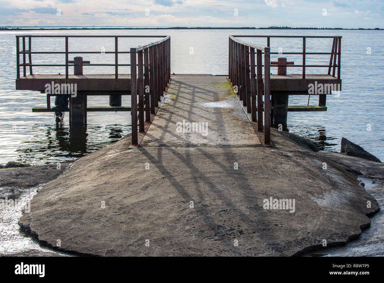 old rusty metal bridge in port. pier in the sea Stock Photo - Alamy