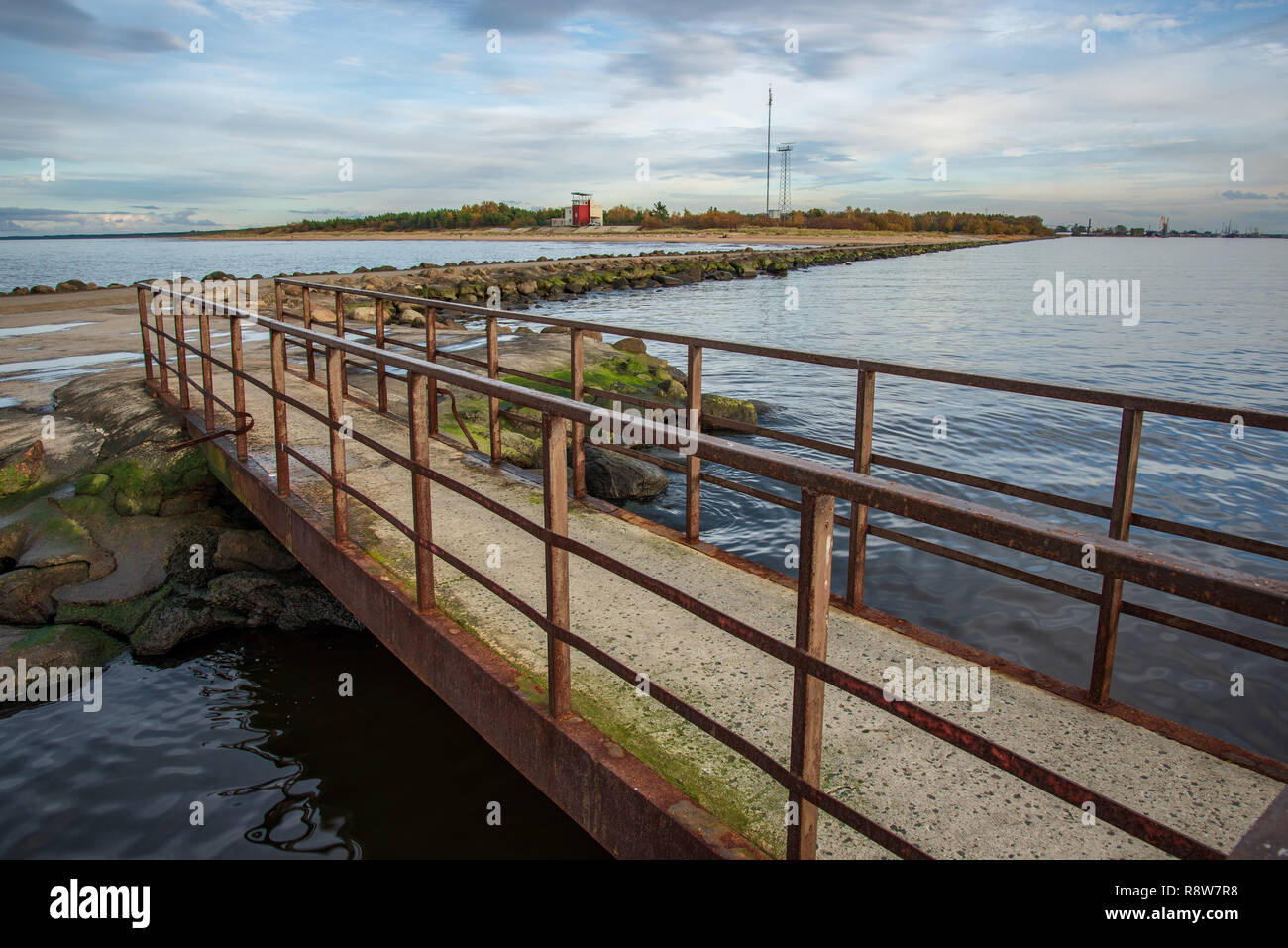 old rusty metal bridge in port. pier in the sea Stock Photo - Alamy