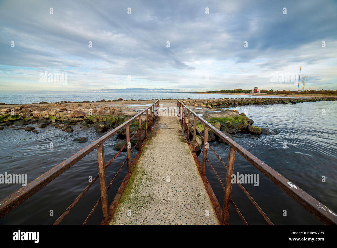 old rusty metal bridge in port. pier in the sea Stock Photo - Alamy