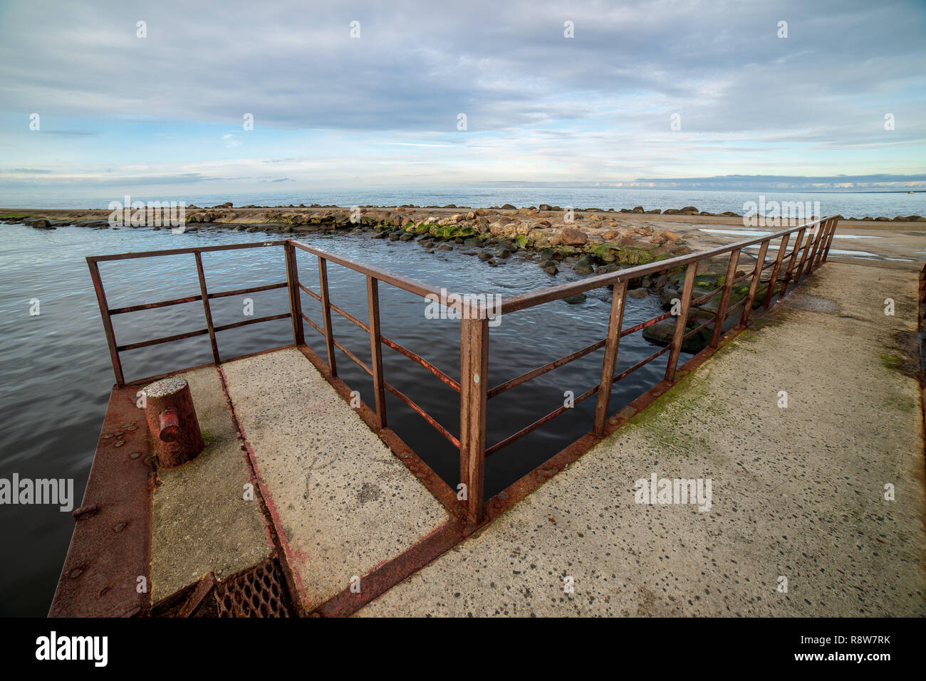 old rusty metal bridge in port. pier in the sea Stock Photo - Alamy
